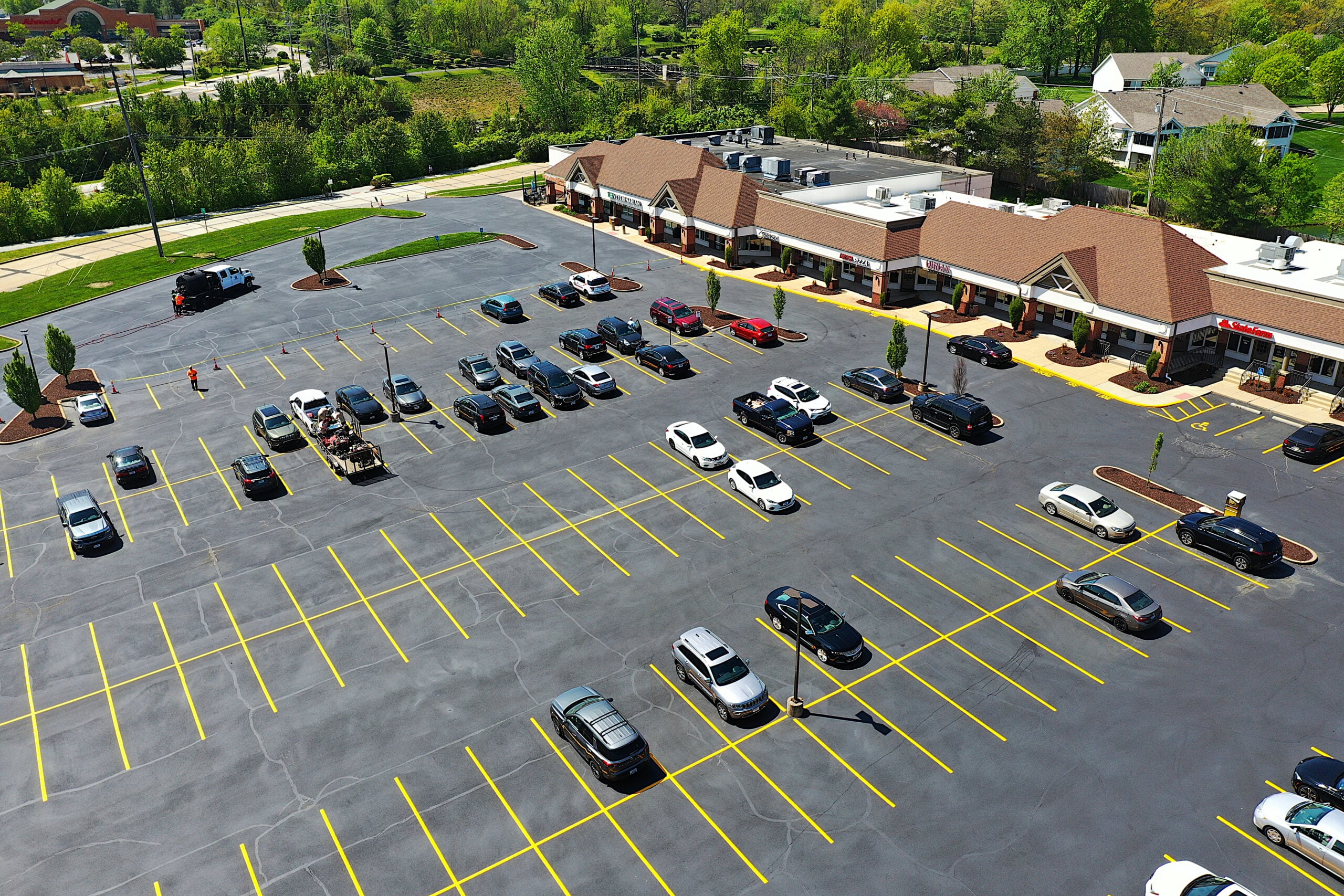Parking Lot Repair, Resurfacing, or Replacement: Which is Right for You ...